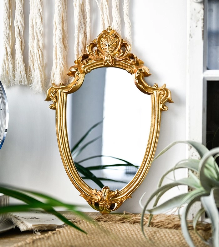 Shield-Shaped Mirror with Gold Embellishment | The Other Aesthetic