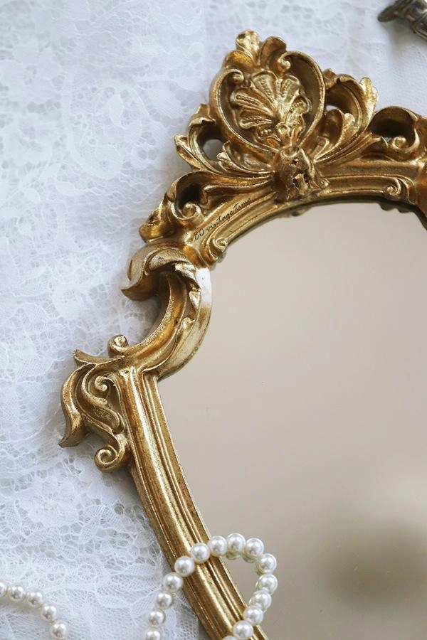 Shield-Shaped Mirror with Gold Embellishment | The Other Aesthetic